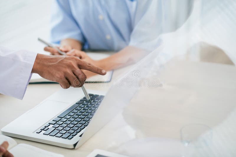 Pointing at Computer Monitor Stock Photo - Image of reading, financial ...