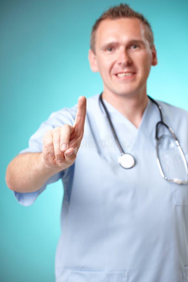 Doctor Pointing at Something with His Finger Stock Photo - Image of ...