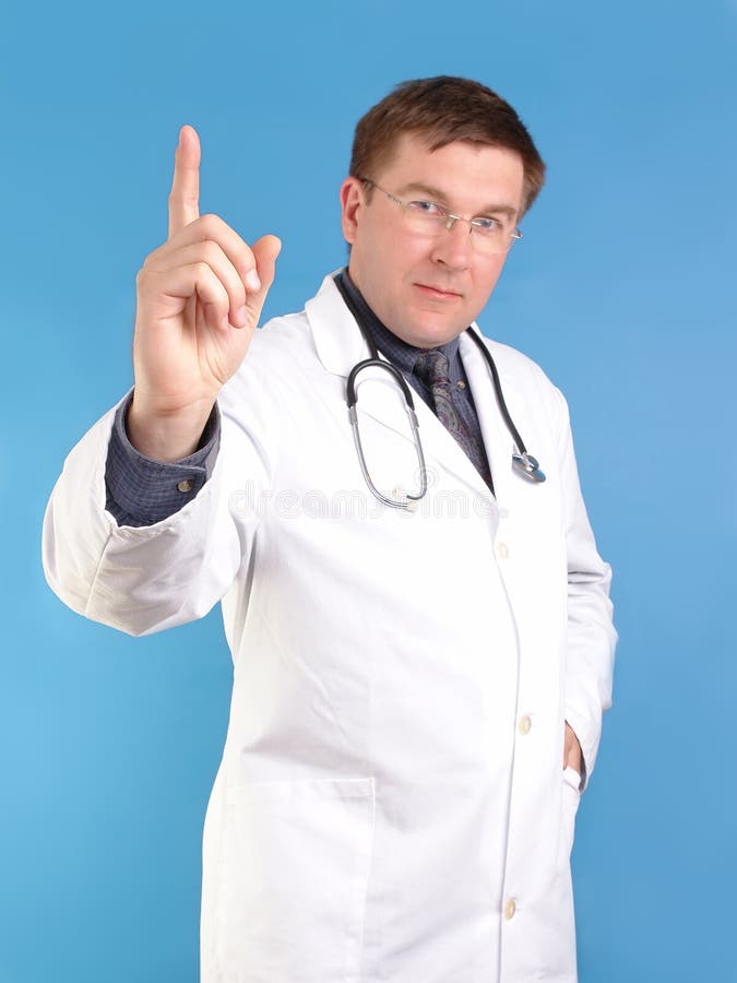 Doctor pointing up stock photo. Image of professional - 2597364
