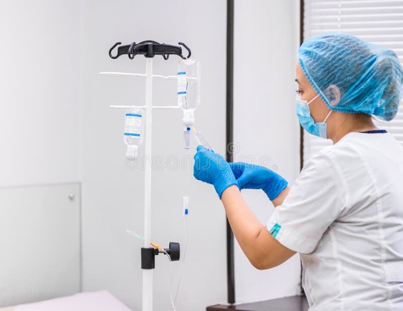 Dropper with Saline Solution Stock Photo - Image of intravenous, covid ...