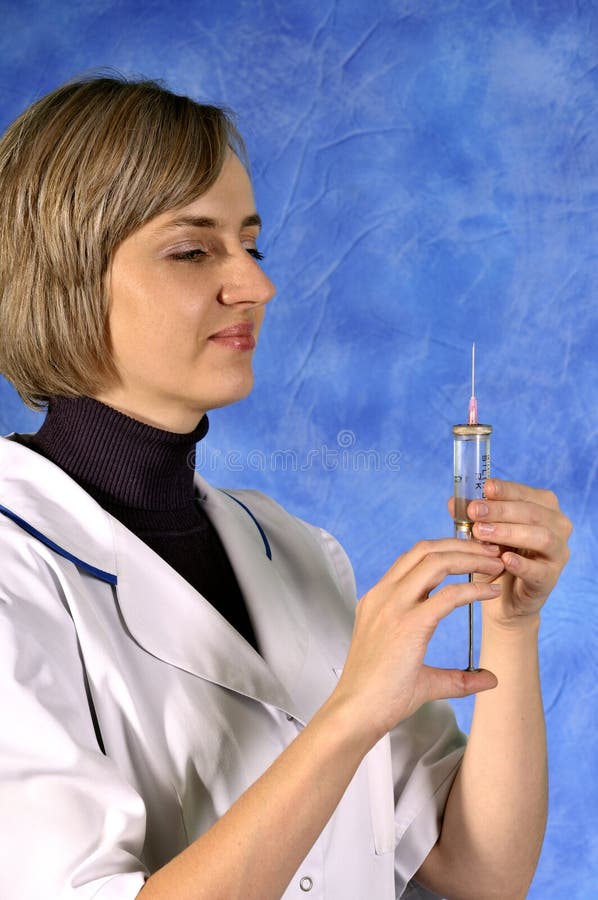 Doctor preparing injection stock photo. Image of doctor - 7417582