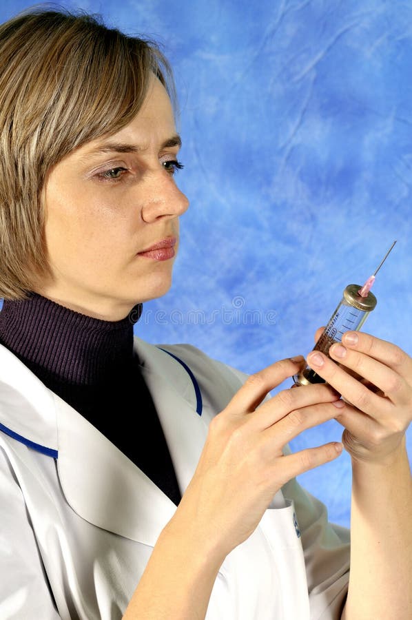 Doctor preparing injection stock photo. Image of inoculation - 7417674