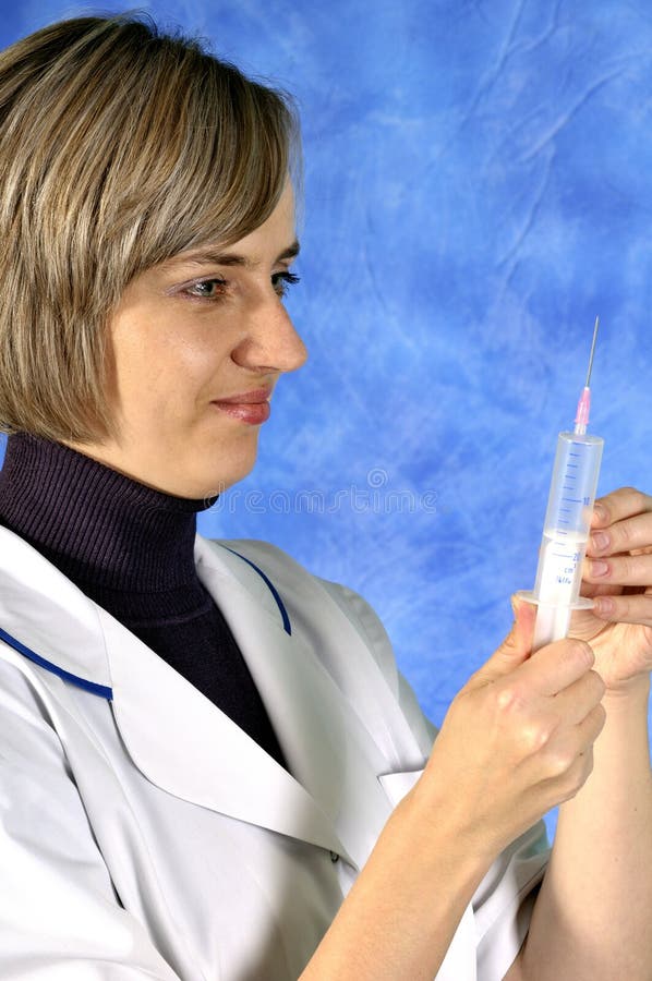 Doctor preparing injection stock photo. Image of medical - 7417680