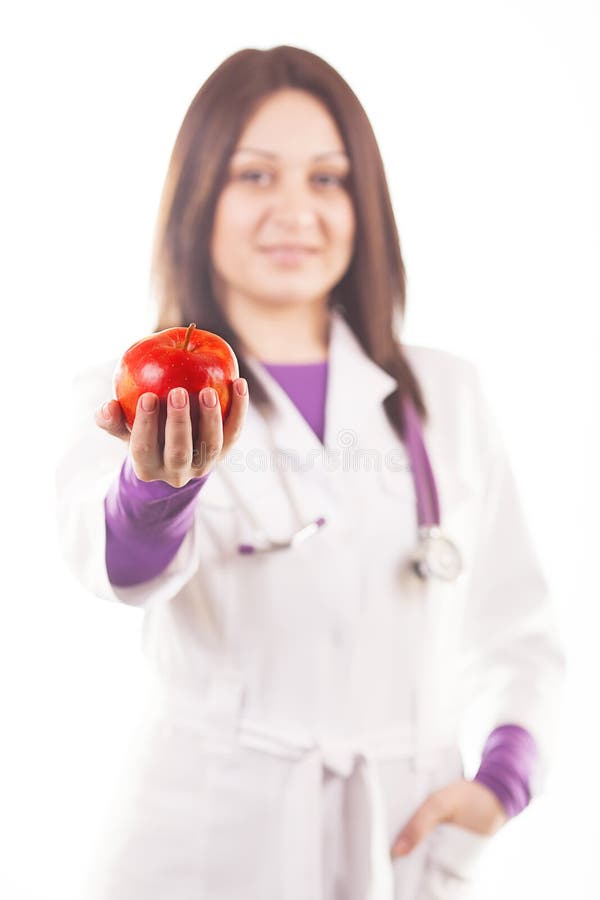 Doctor Presenting a Red Apple Stock Photo - Image of healthcare ...