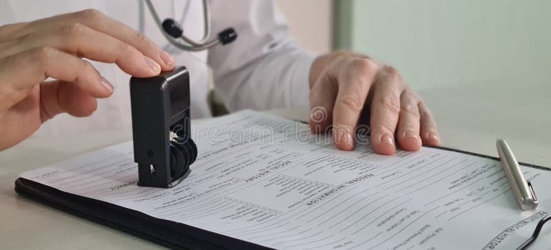 Doctor Puts a Stamp on Medical Documents Closeup Stock Image - Image of ...