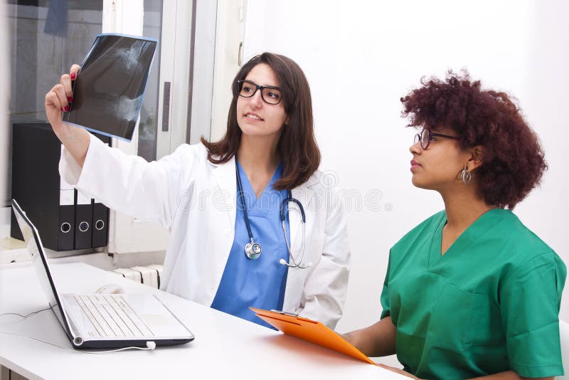 Doctor with radiography stock image. Image of services - 70743547