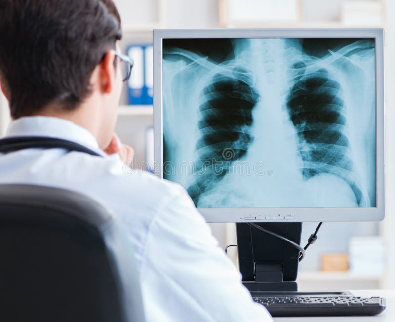 Doctor Radiologist Looking at X-ray Images Stock Image - Image of ...