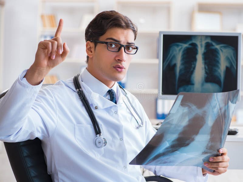 Doctor Radiologist Looking at X-ray Images Stock Image - Image of ...