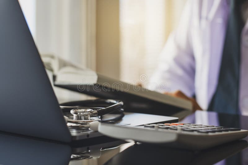 Doctor read book stock image. Image of hospital, computer - 190188007