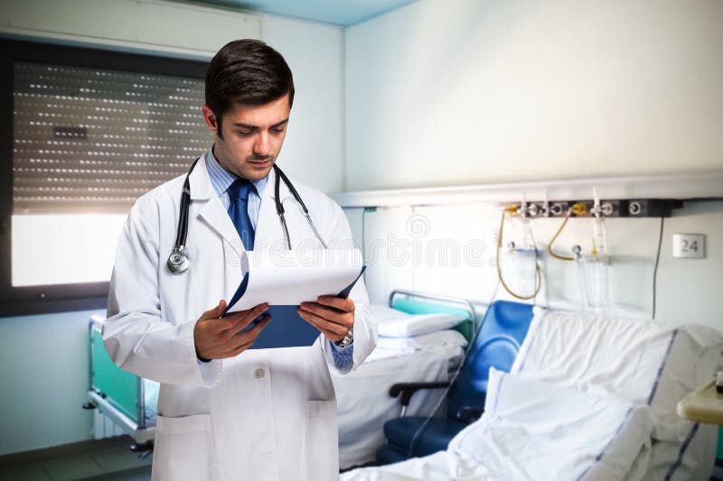 Doctor reading a document stock image. Image of hospital - 47449835