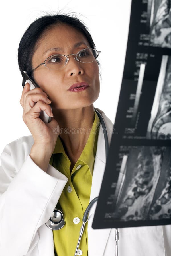 Doctor Reading MRI scan stock image. Image of medicine - 13192465