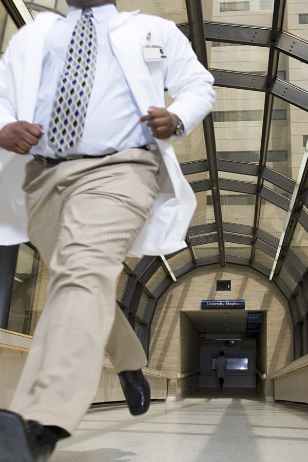 Doctor Running through Hospital Stock Photo - Image of life, hospital ...