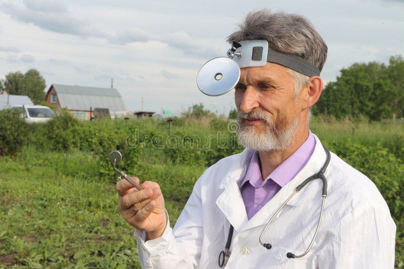 Doctor in rural areas stock photo. Image of grass, male - 59558768