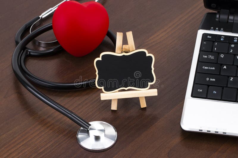 The Doctor`s Desk with Stethoscope and Red Heart and Blackboard Stock ...