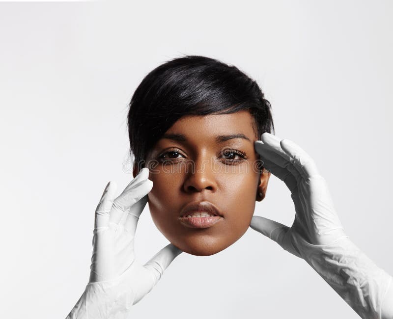 Doctor`s Hand Holding a Face Stock Image - Image of bodycare, hand ...