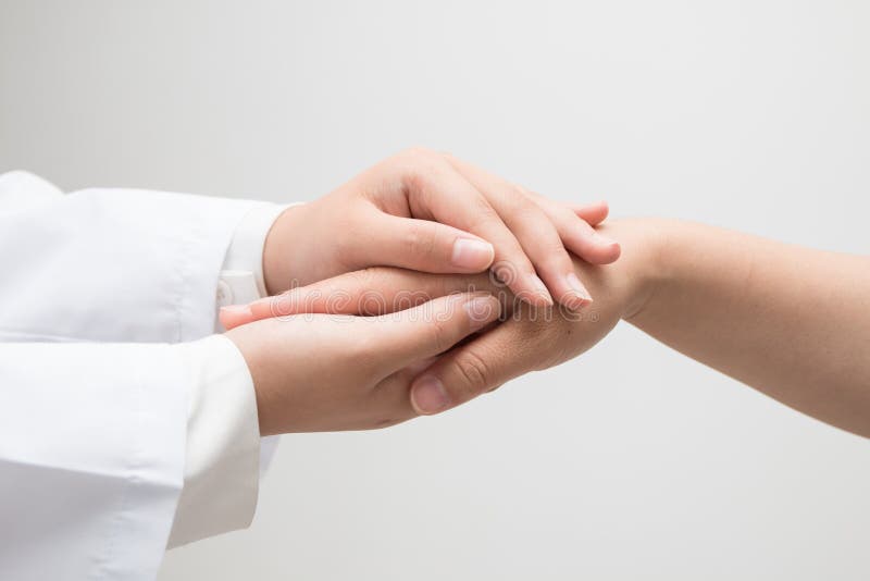Doctor Holding Patient`s Hand. Medicine And Health Care Concept. Stock ...