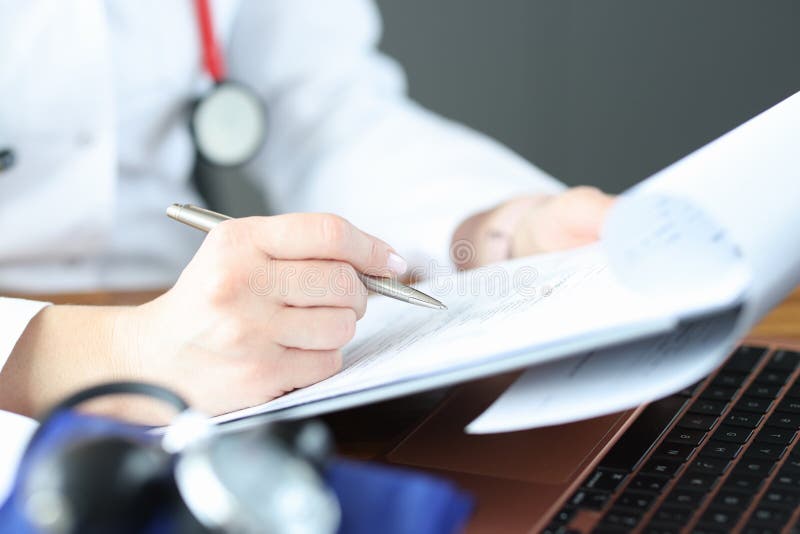 Doctor S Hand Makes Note on Medical Documents Stock Image - Image of ...
