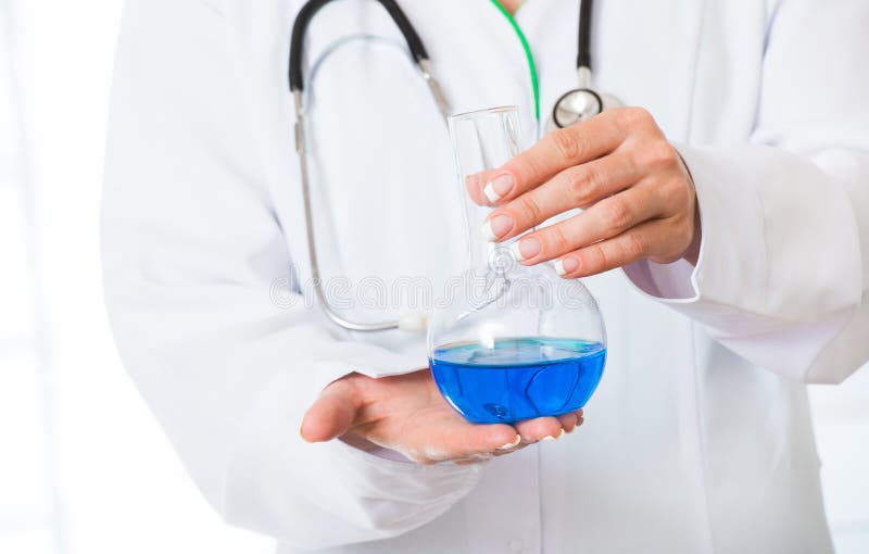 Doctor s hands with flask stock photo. Image of flask - 53790280