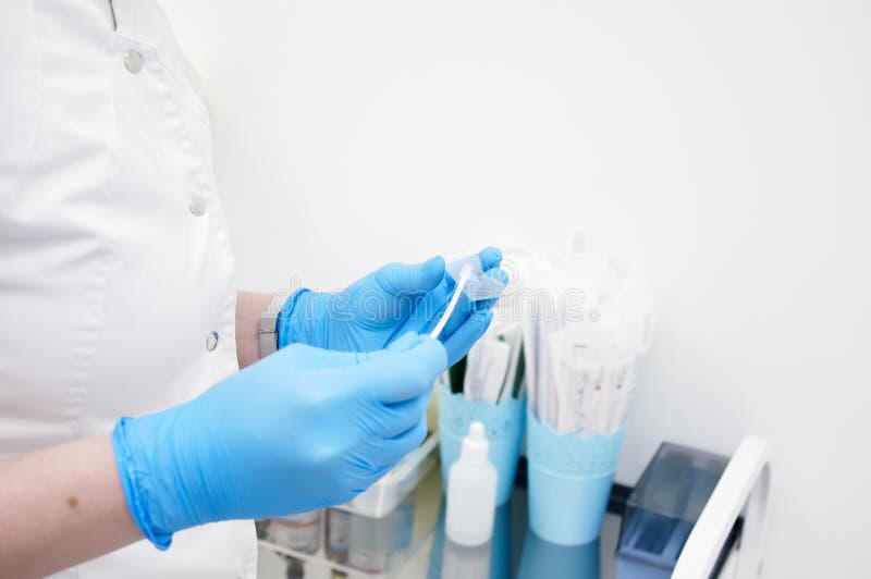 Doctor S Hands Holding Microscope Slide Stock Photo - Image of ...