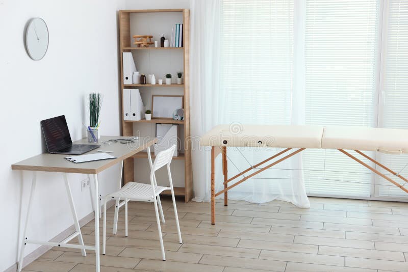 Doctor`s Office with Couch and Work Table. Doctor`s Workplace Stock ...