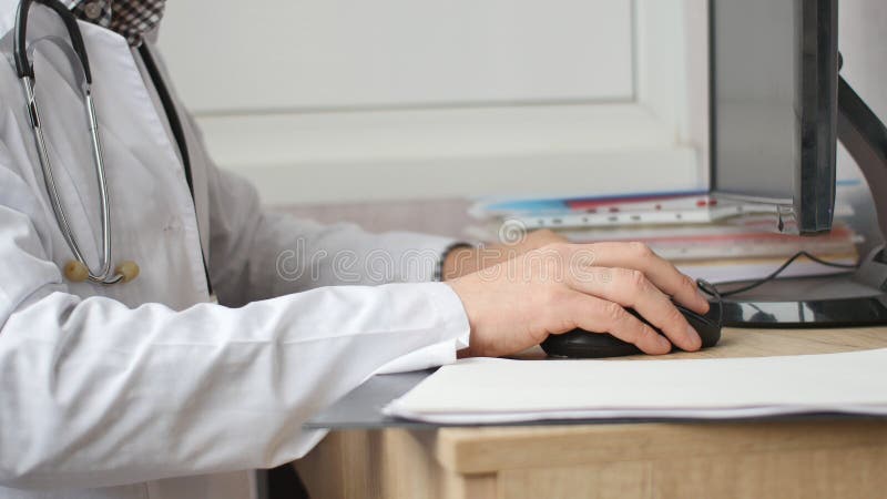 Male Doctor Working at His Personal Computer Stock Image - Image of ...