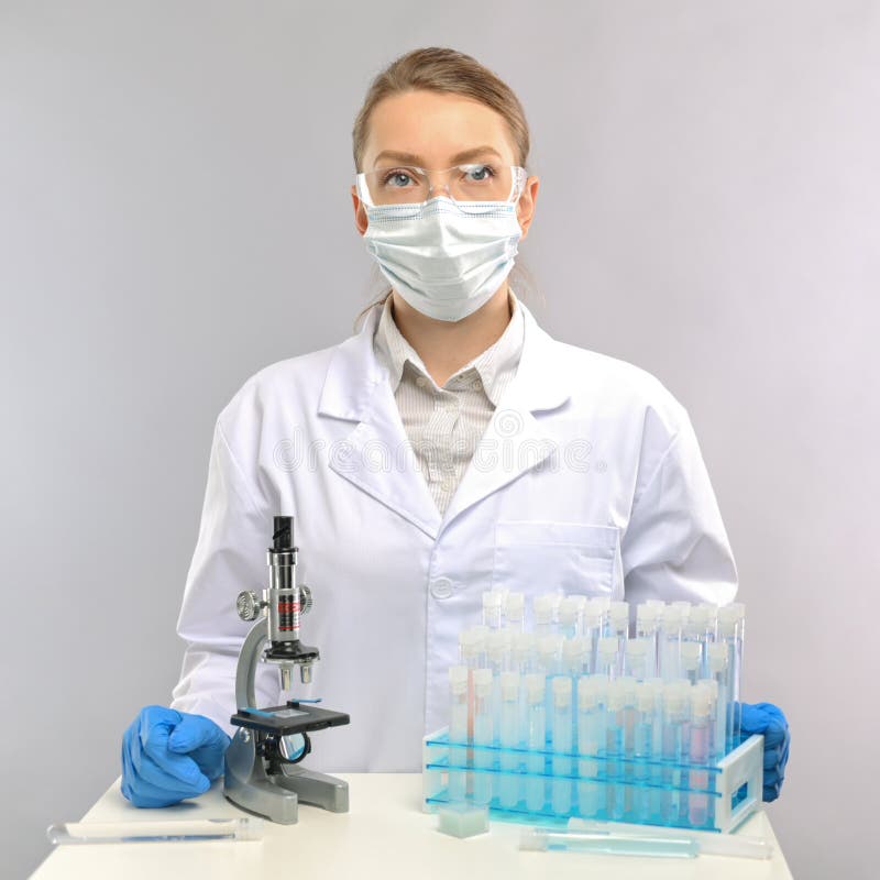 Doctor, Scientific or Laboratory Assistant Exploring with Microscope ...