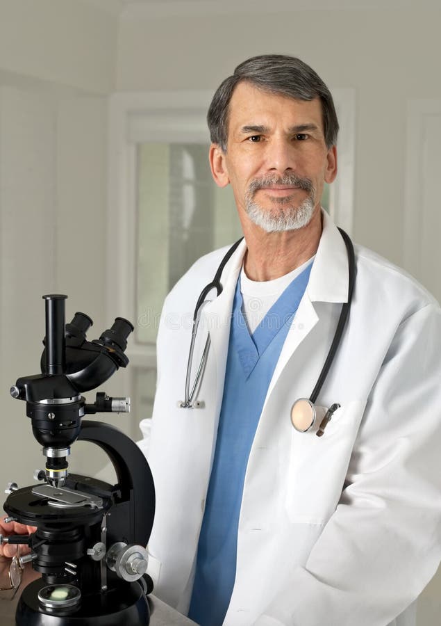 Doctor or Scientist at the Microscope Stock Photo - Image of laboratory ...