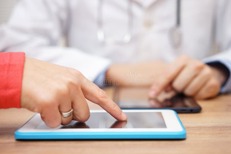 Doctor is Sending Result of Medical Test To Patient on Tablet C Stock ...