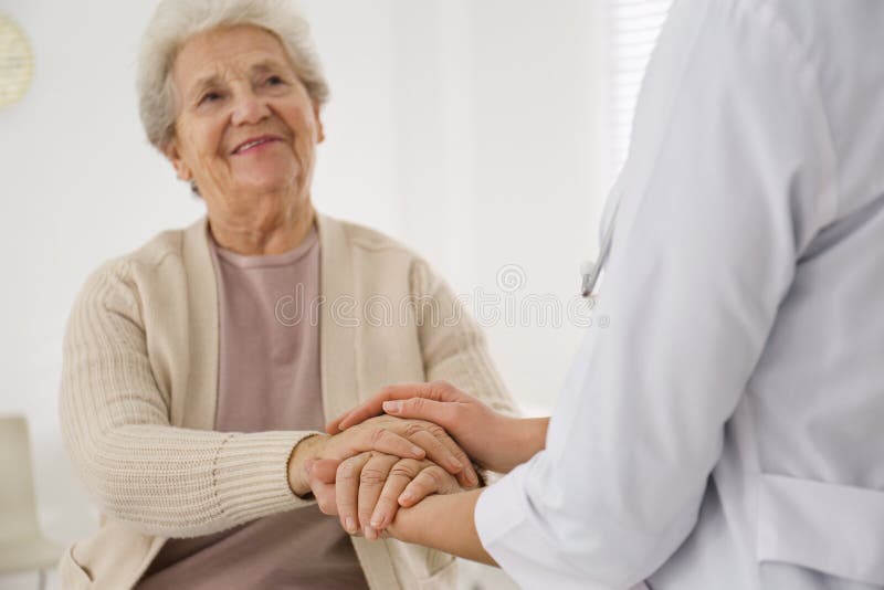 Doctor with Senior Patient, Focus on Hands Stock Image - Image of ...