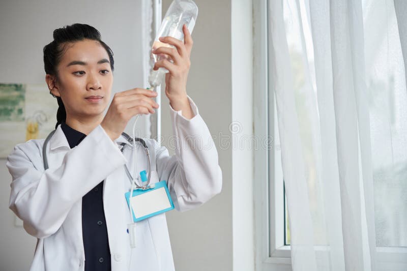 Doctor Setting Drop Counter Stock Image - Image of emergency ...