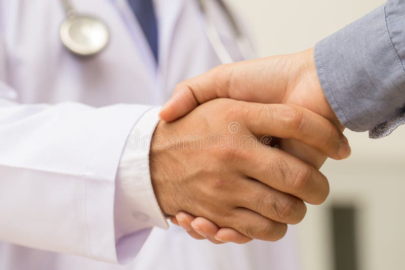 Doctor Shakes Hands with a Patient Stock Photo - Image of medicine ...