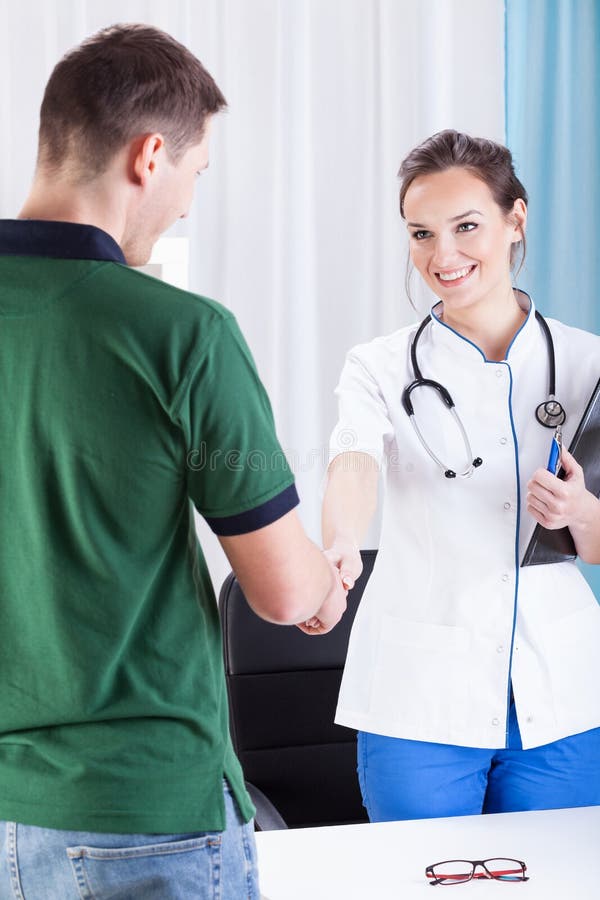 Doctor Shakes Hands with Patient Stock Photo - Image of hospital ...