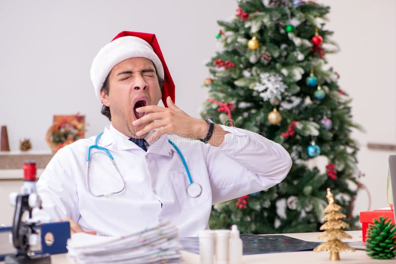 The Doctor on the Shift on Christmas Eve Stock Image - Image of clinic ...