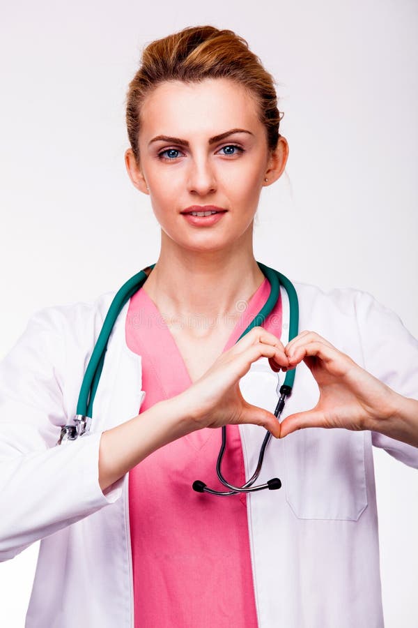 Doctor showing heart sign stock photo. Image of nurse - 31206478