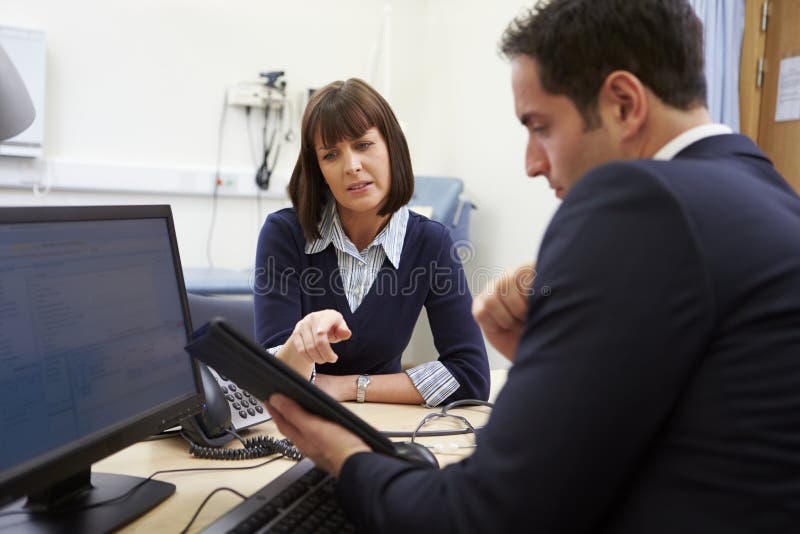 Doctor Showing Patient Test Results on Digital Tablet Stock Image ...