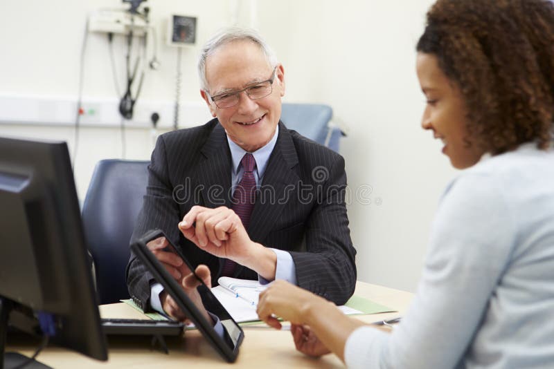 Doctor Showing Patient Test Results on Digital Tablet Stock Image ...