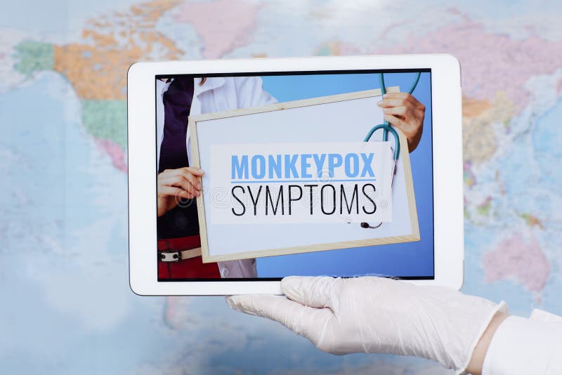 Doctor Showing Tablet PC with Monkeypox Symptoms Screen Stock Image ...