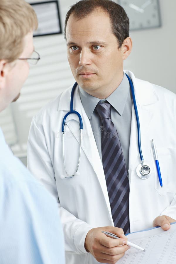 Doctor Showing Test Results Stock Photo - Image of caucasian, healing ...