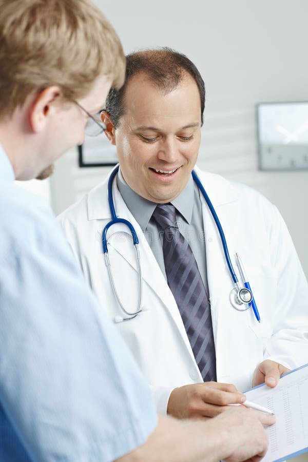 Doctor Showing Test Results Stock Photo - Image of casual, color: 12819316