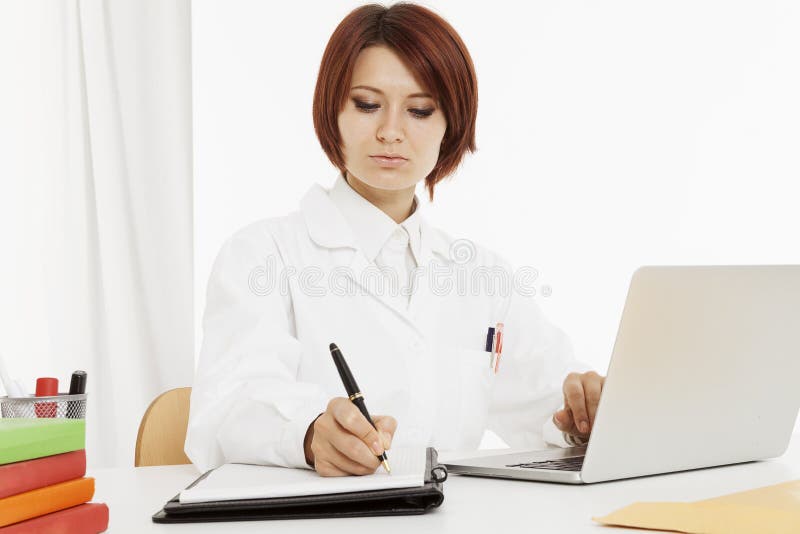 Doctor Sitting Behind Her Desk Stock Image - Image of medicine ...