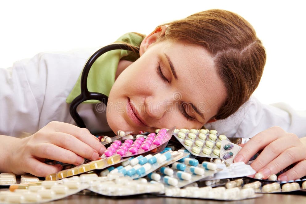 Doctor Sleeping on Heap of Pills Stock Photo - Image of decision, head ...