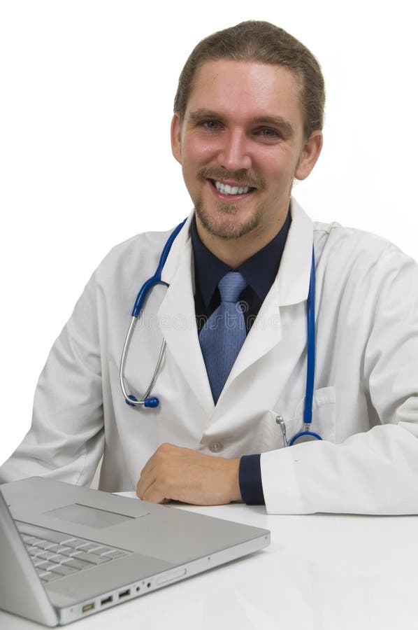 Doctor with a Smile Sitting at His Desk Stock Photo - Image of smiling ...