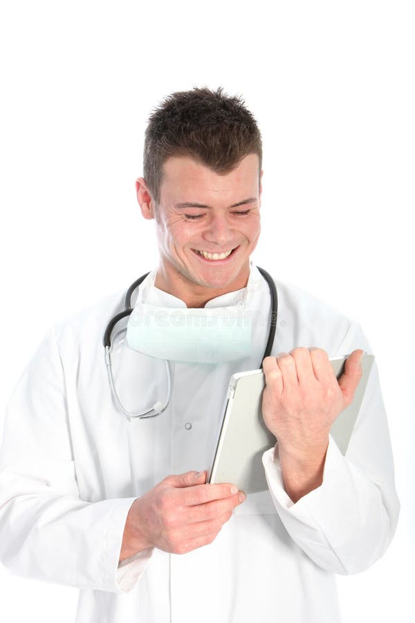 Doctor Smiling at Information on His Tablet Stock Image - Image of ...