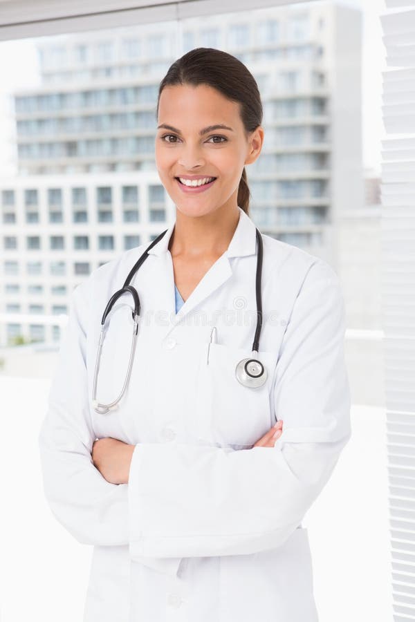 Doctor Smiling Looking at Camera Stock Photo - Image of working ...