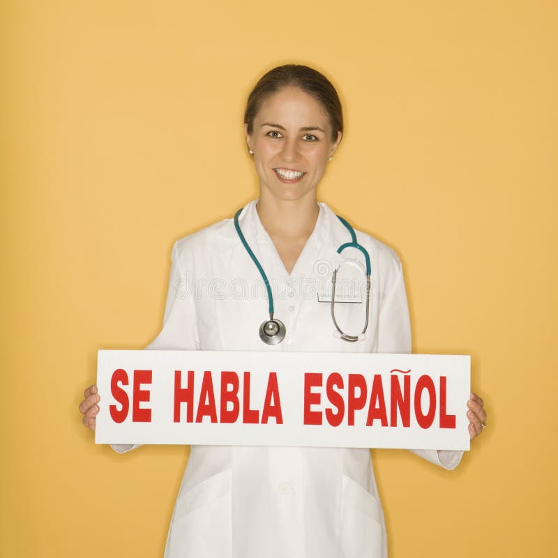 Doctor and Spanish sign. stock photo. Image of medical - 2431942