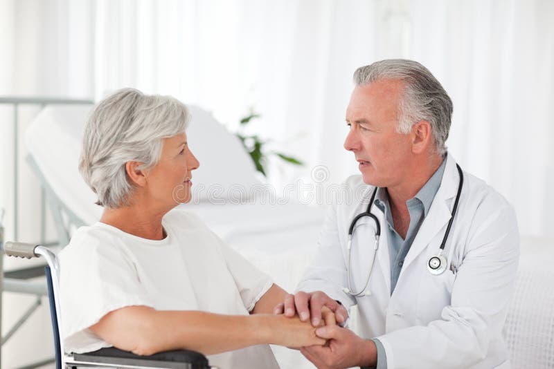 Doctor Speaking with His Patient Stock Photo - Image of lifestyle ...
