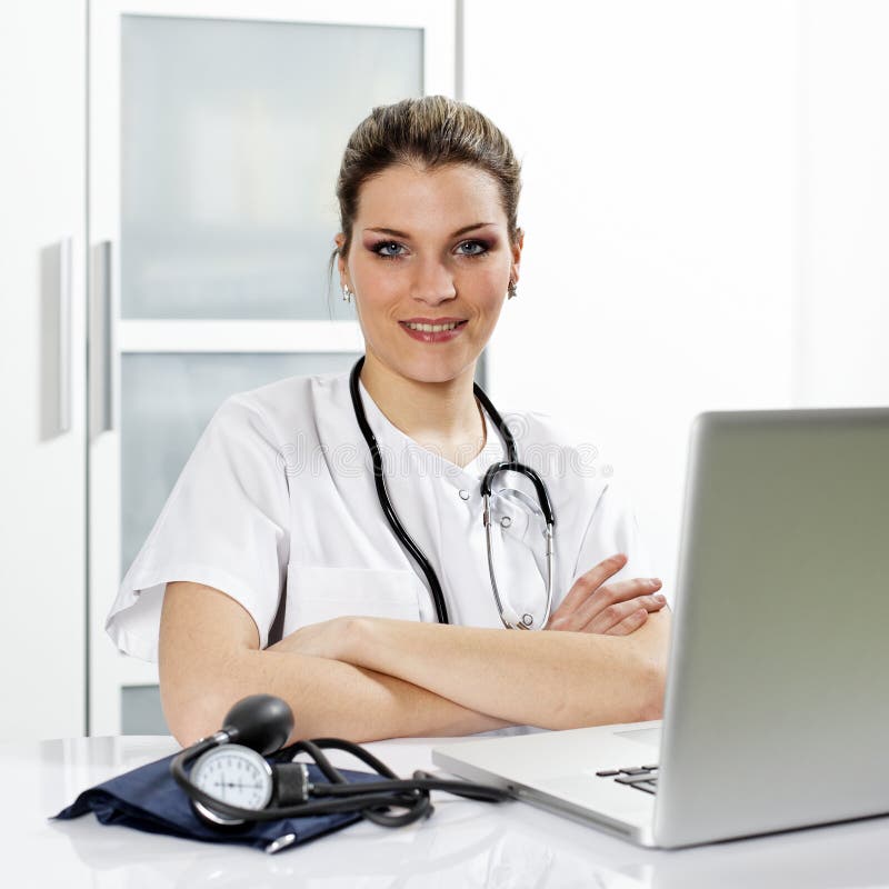 Doctor at her desk stock photo. Image of cure, health - 5158196