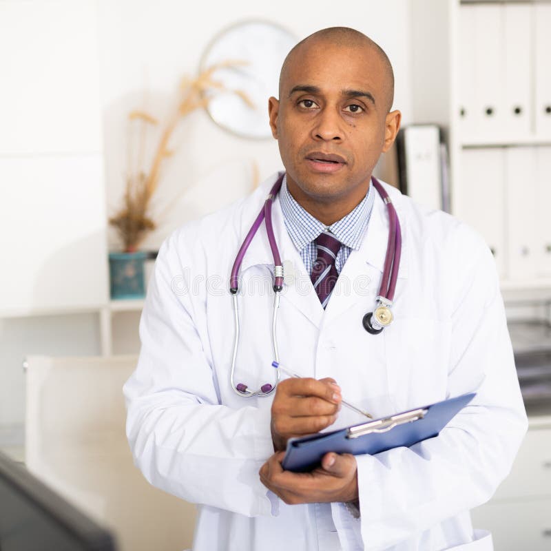 Doctor is Standing with Documents Stock Image - Image of hygiene ...