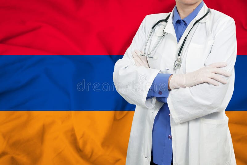 Doctor standing with flag stock photo. Image of country - 230852514