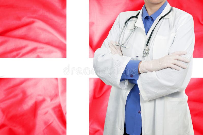 Doctor standing with flag stock photo. Image of nurse - 230852848